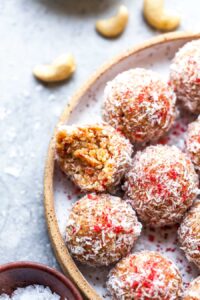 Strawberries and Cream Energy Balls - Dishing Out Health