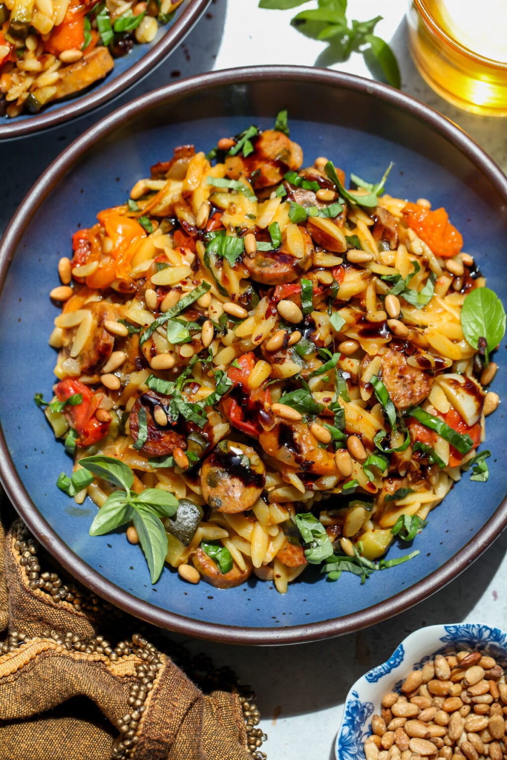 One Pan Chicken Sausage Orzo with Burst Tomatoes - Dishing Out Health